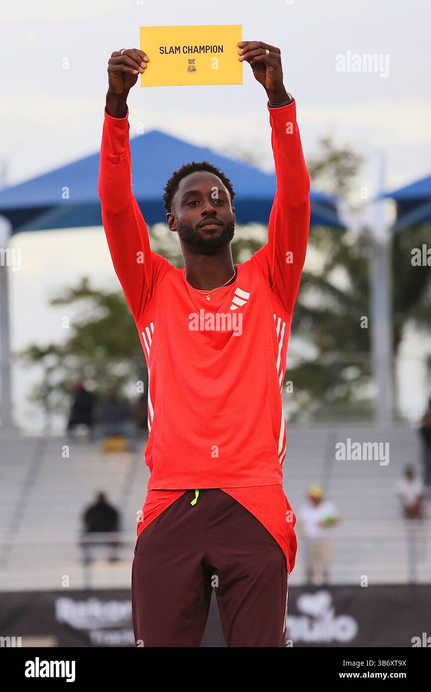 Jereem Richards celebrates being a Slam Champion during the Grand Slam ...
