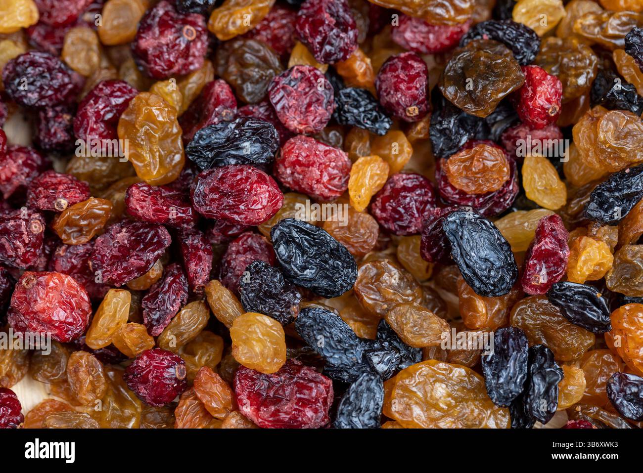 dried fruits of red cranberries and raisins mixed together, different ...