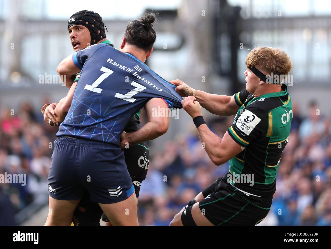Northampton Saints' Henry Pollock and Leinster's James Lowe during the ...