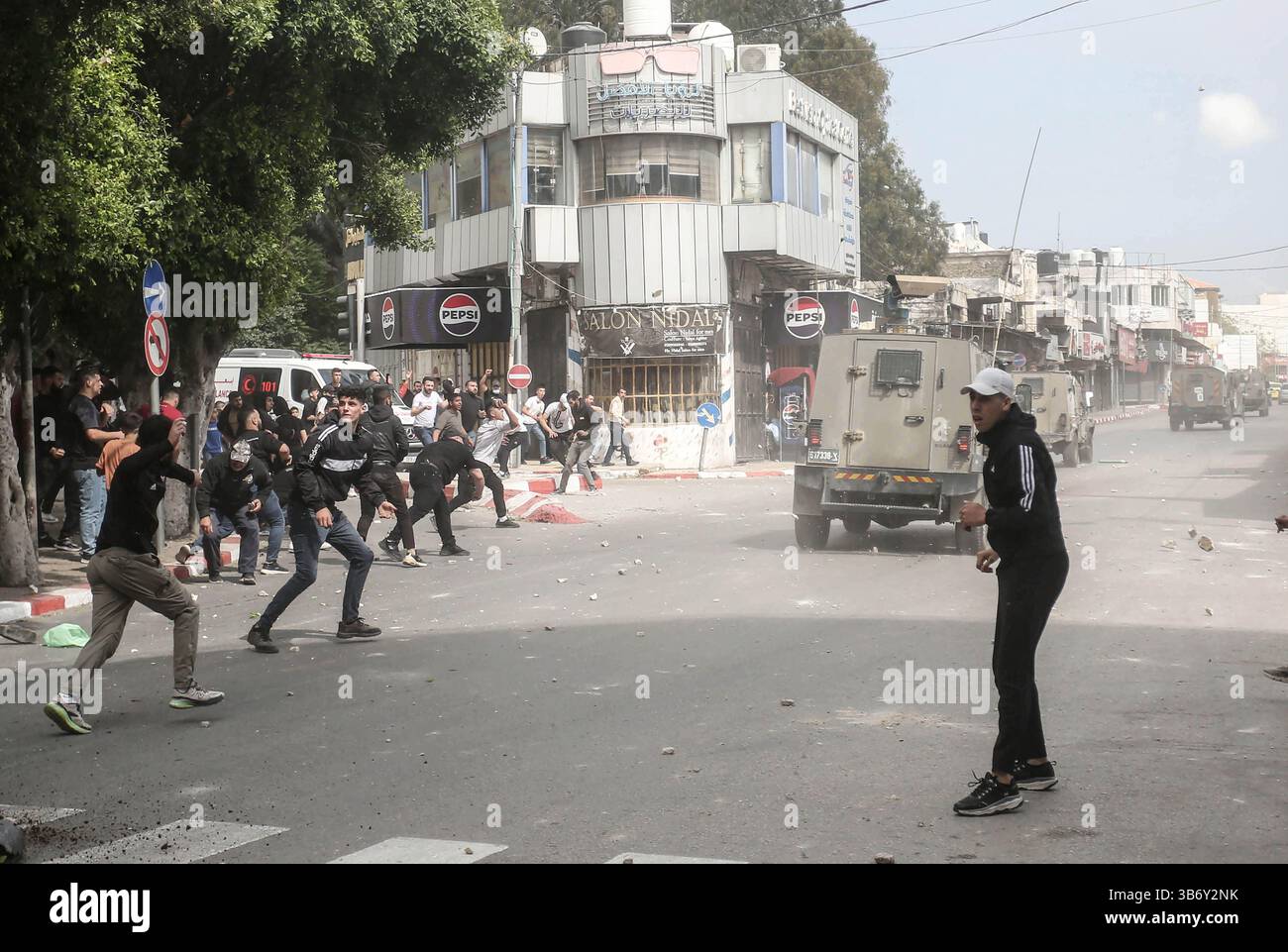 Nablus, Palestine. 04th May, 2025. Palestinians throw stones at Israeli ...