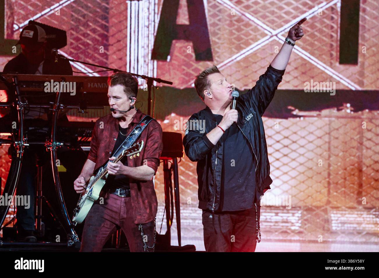 Gary Levox, Jay Demarcus of Rascal Flatts perform during the iHeart ...