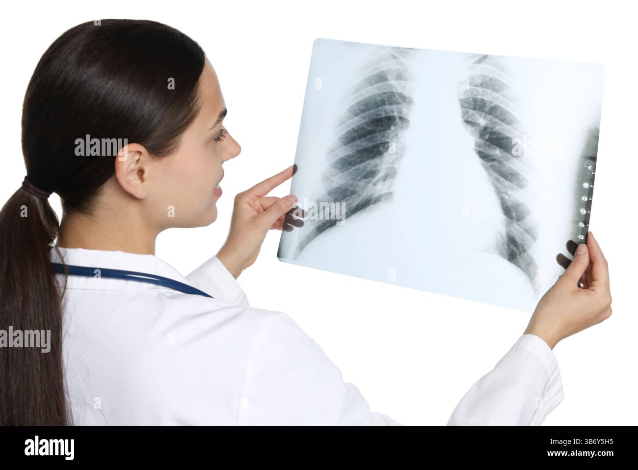 Doctor examining MRI scan on white background, back view Stock Photo ...