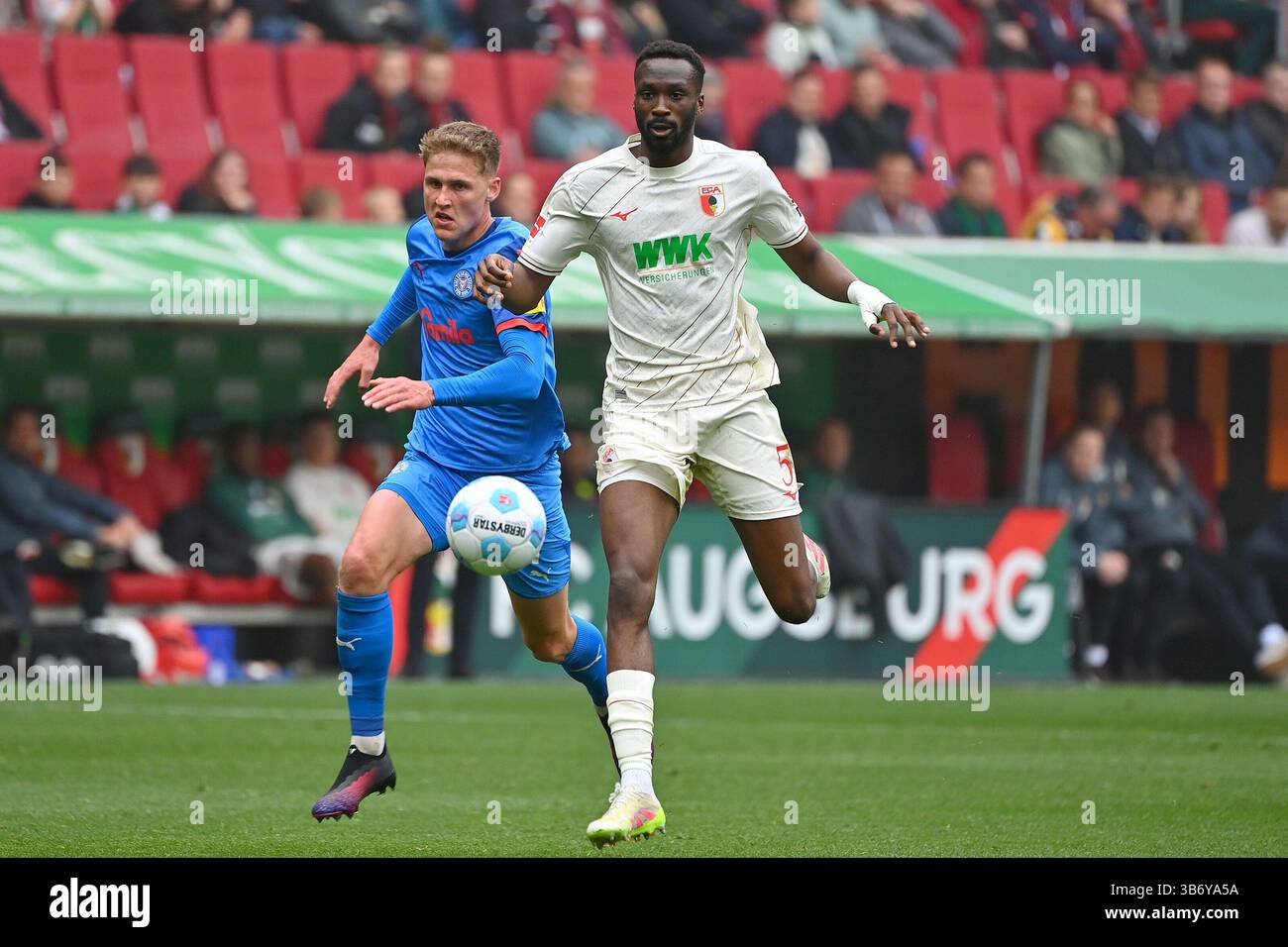 Chrislain MATSIMA (FC AUGSBURG), action, duels . Soccer 1st Bundesliga ...