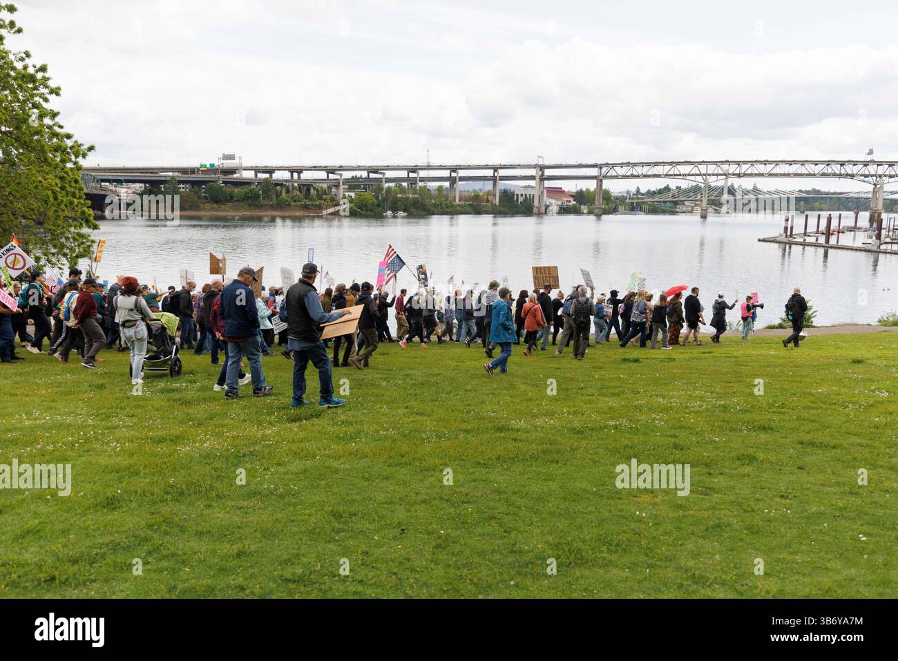 Over a thousand people rallied and then marched at Waterfront Park in ...