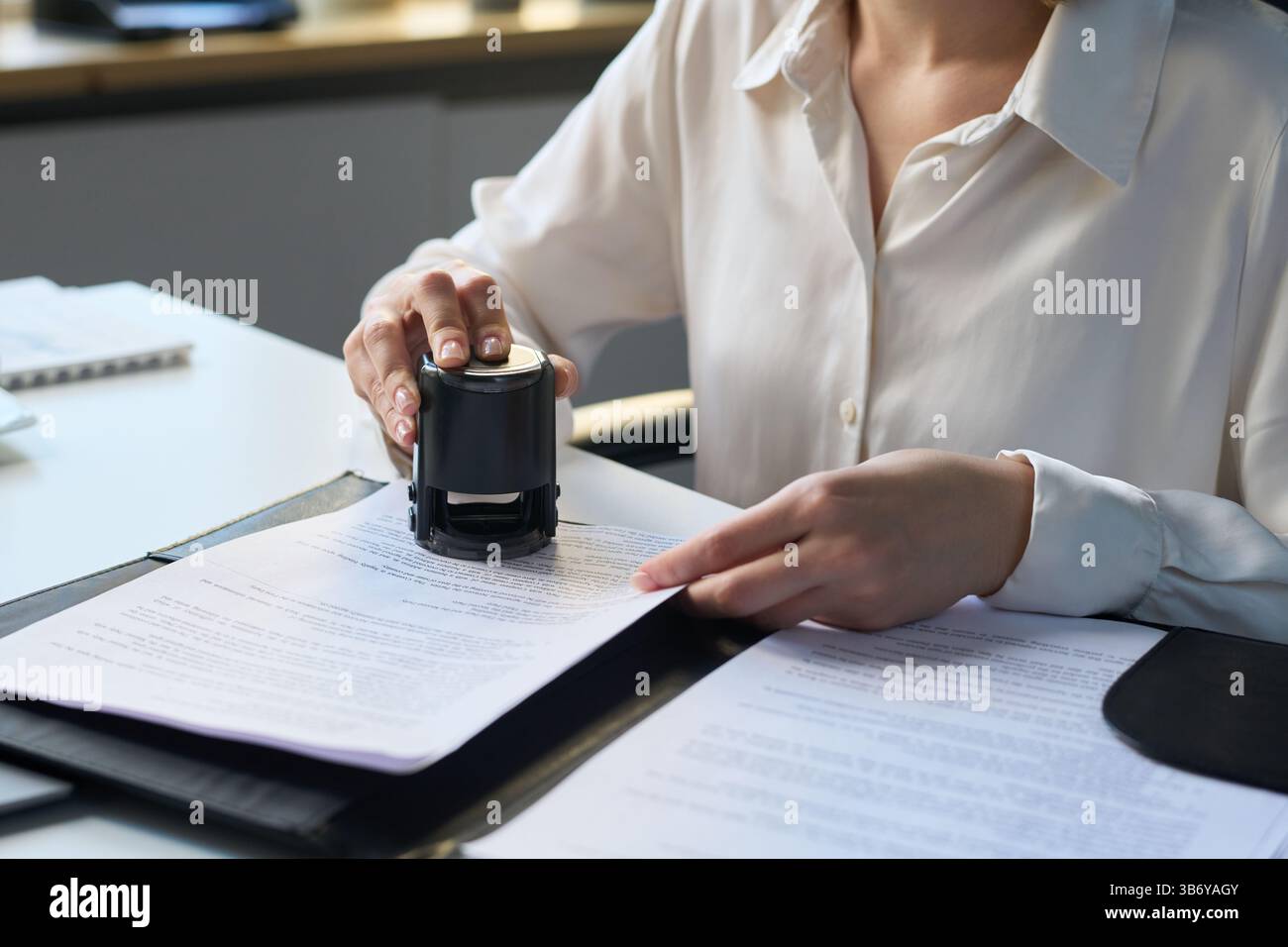 Unrecognizable businesswoman putting stamp hi-res stock photography and ...