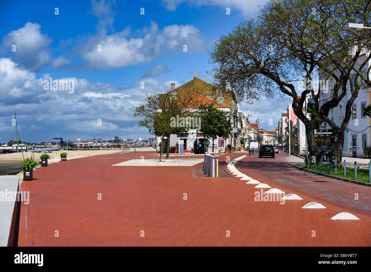 Seixal riverside promenade with traditional houses, marina in the ...