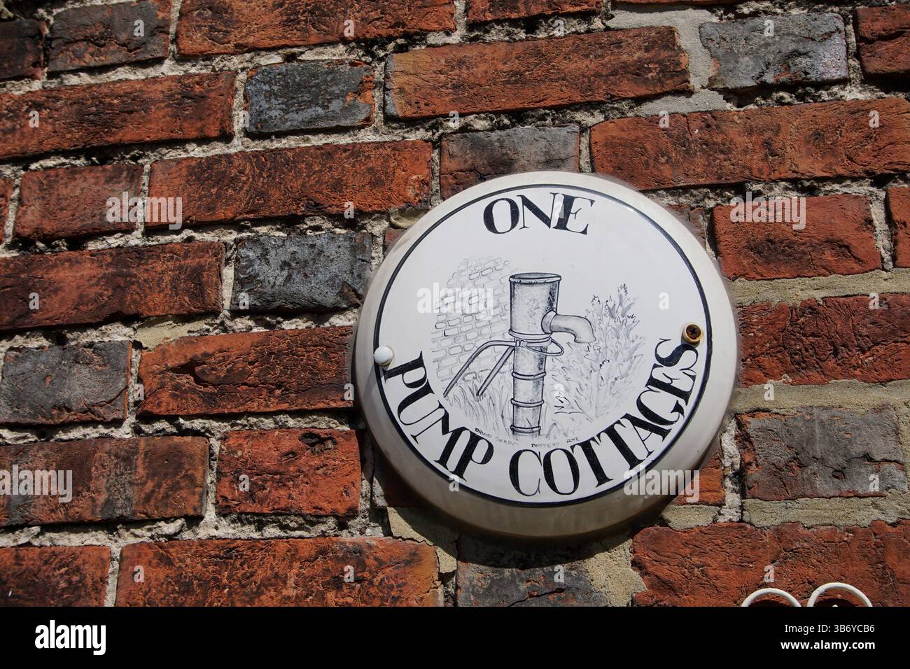 Rye Camber road signs heritage concepts Stock Photo - Alamy
