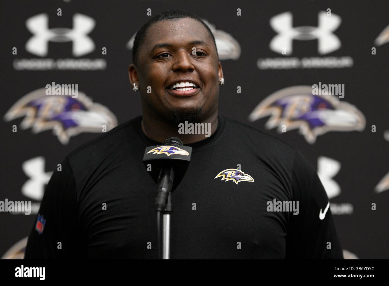 Baltimore Ravens defensive lineman Aeneas Peebles talks to the media ...