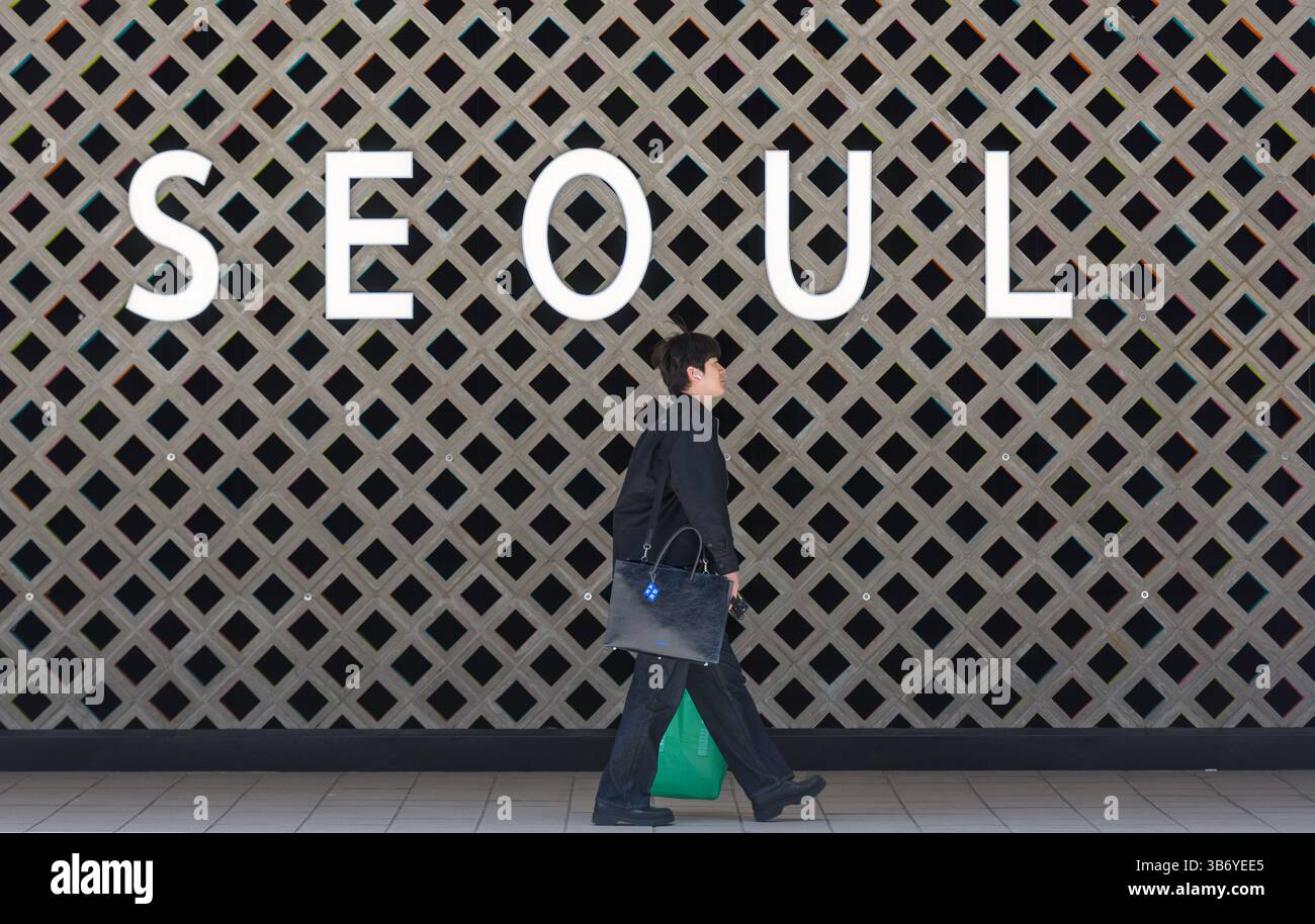 Seoul, South Korea. 4th May, 2025. A person passes through a place ...