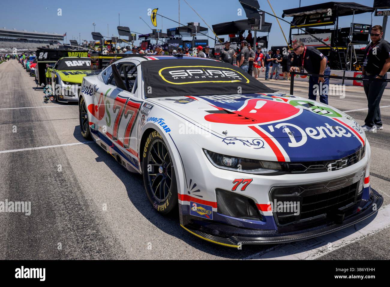 Carson Hocevar's car (77) sits on pit road after winning his first ...