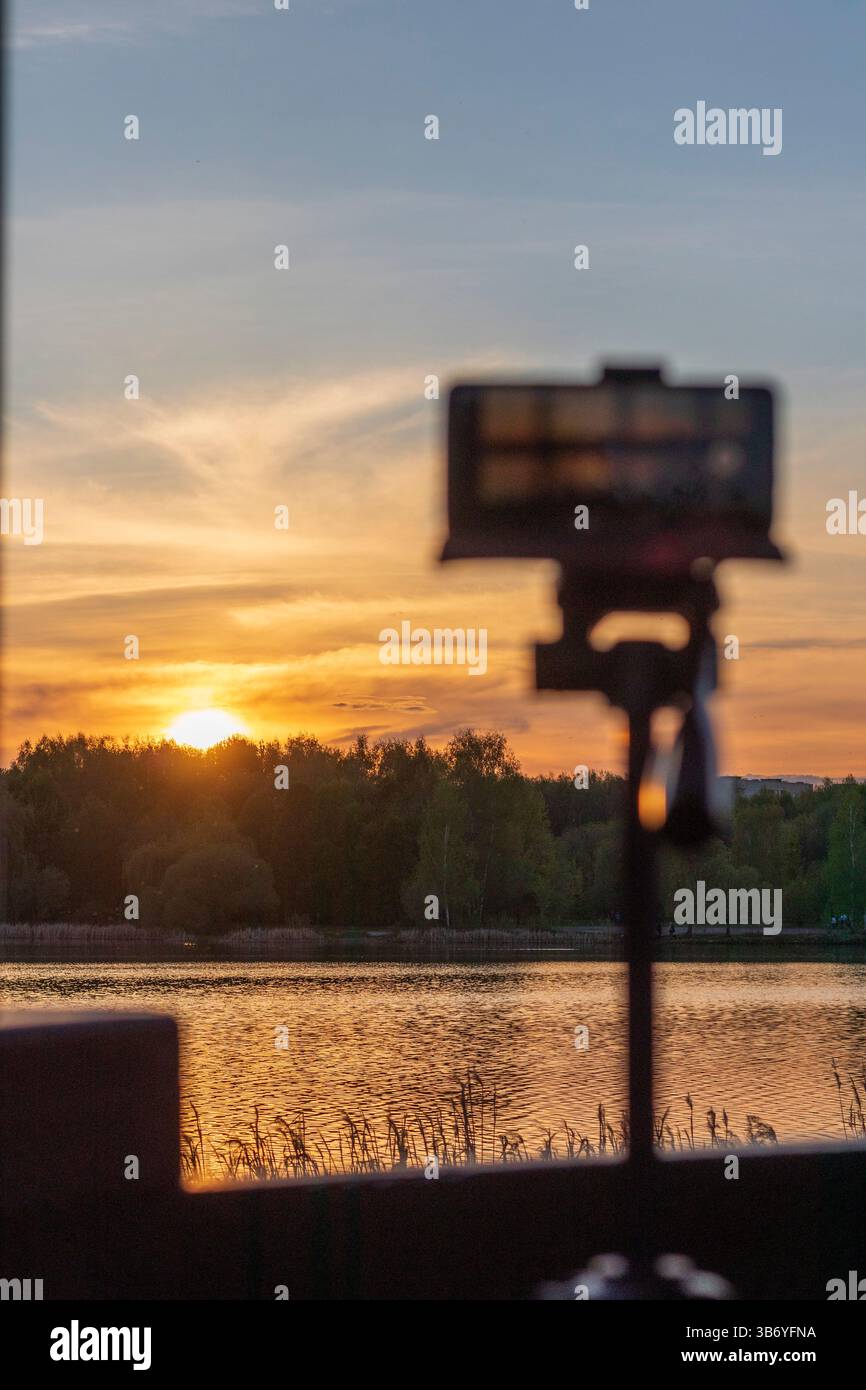 Camera on tripod phone recording hi-res stock photography and images ...