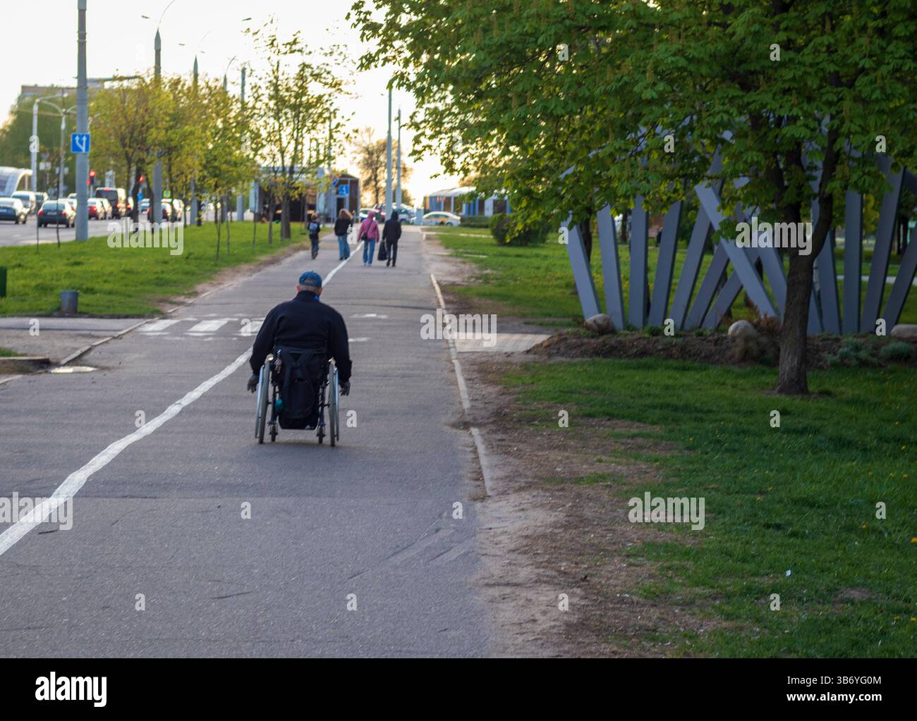 Shot of the handicapped man on the wheelchair on the city streets Stock ...