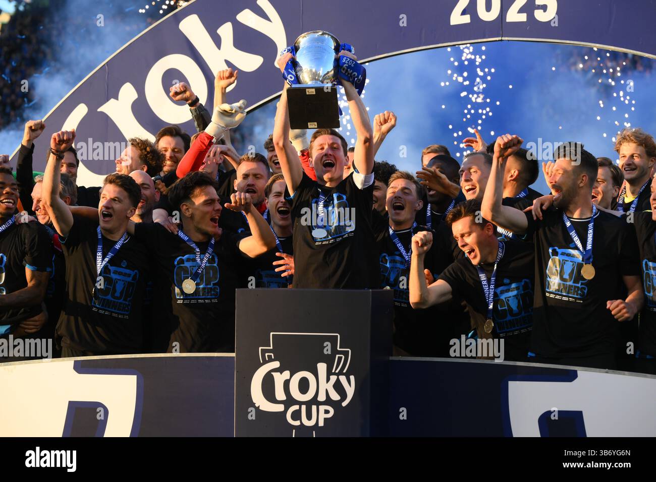 Club's players celebrate on the podium after winning a soccer game between Club Brugge and RSC ...