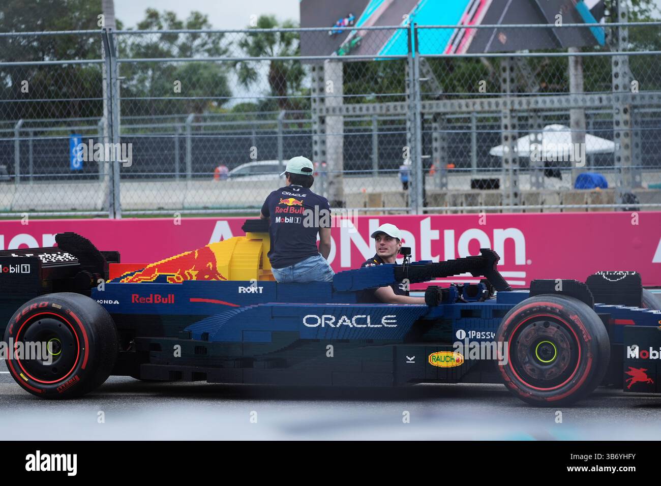Red Bull Racing drivers Max Verstappen and Yuki Tsunoda drive before ...