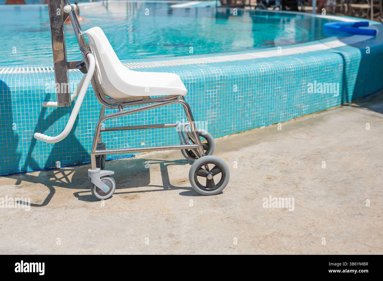 Accessible swimming pool with chair lift for people with disabilities ...