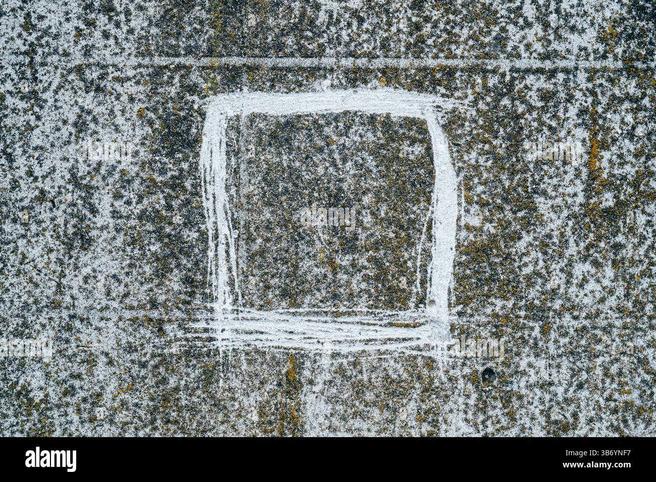 Square shape scratching on a concrete wall as background and copy space ...