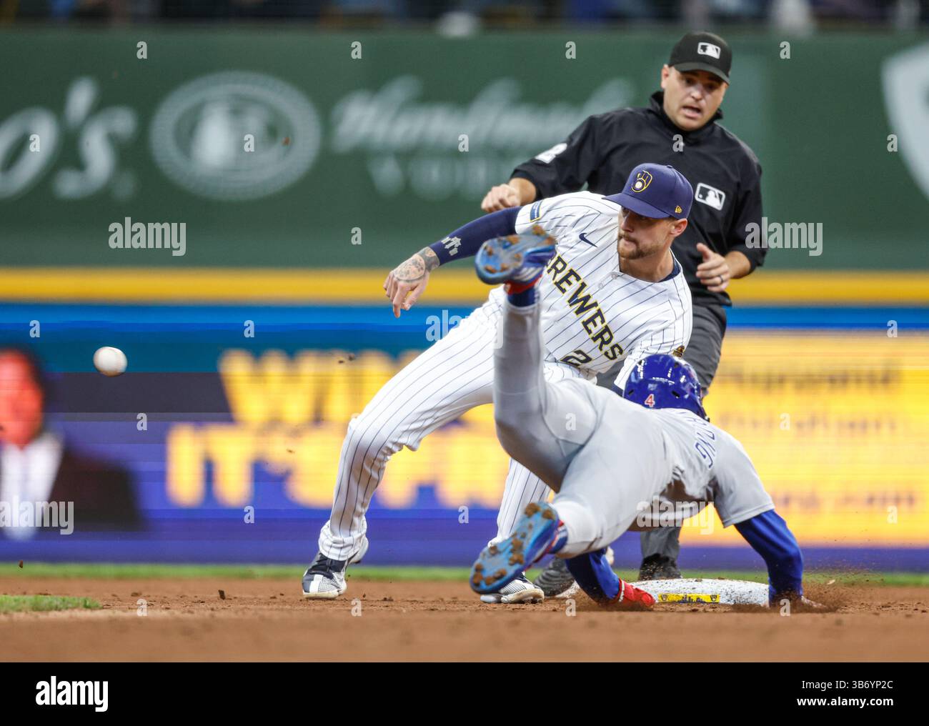 Chicago Cubs' Pete Crow-Armstrong, bottom, is tagged out while trying ...