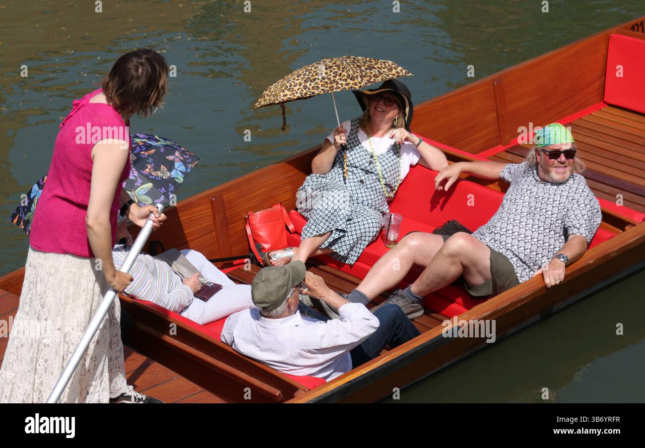 People enjoy a punt on the River Cam on possibly the hottest day of the ...