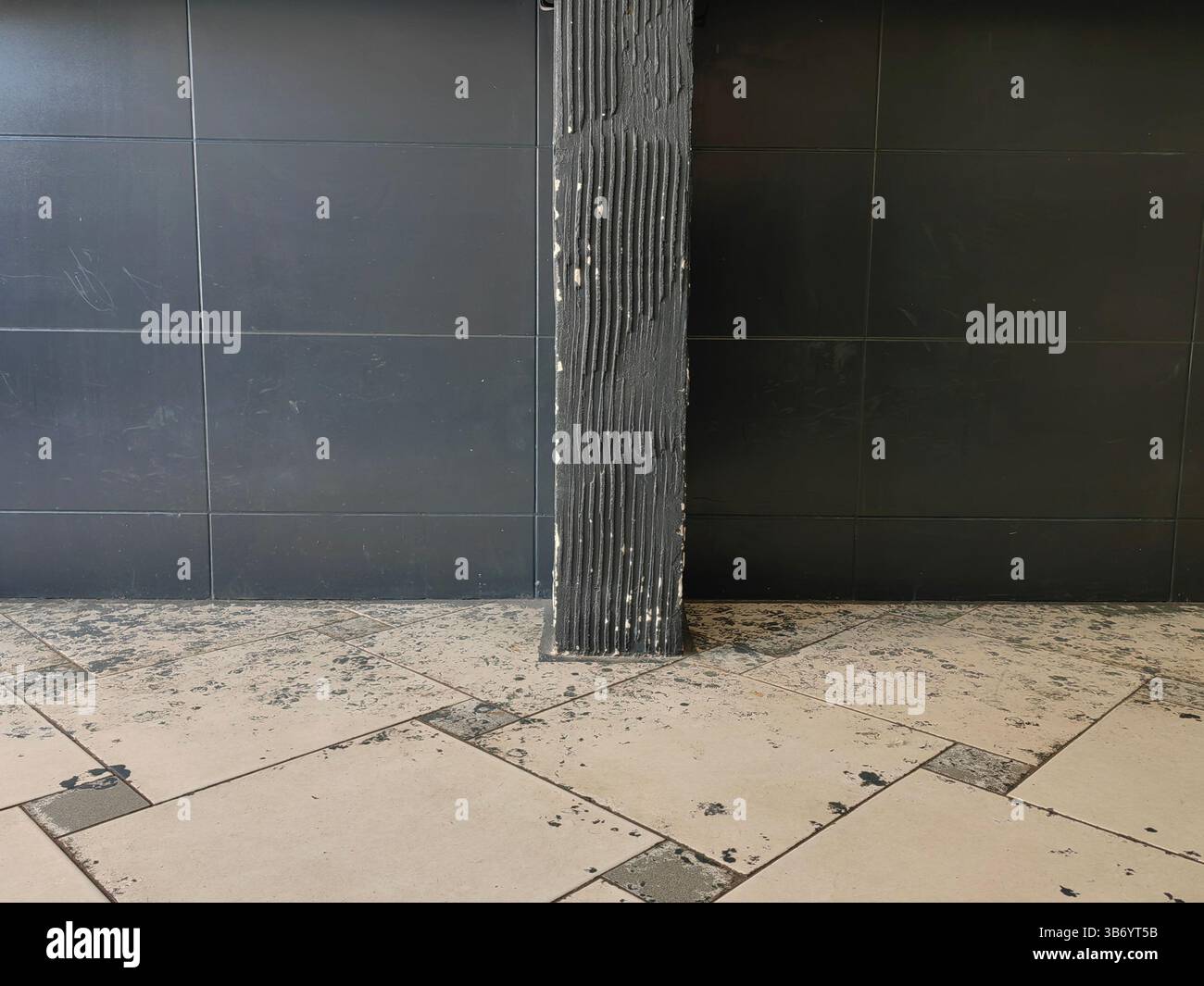 Centerline: Gray Pillar in Monochrome Space Stock Photo - Alamy