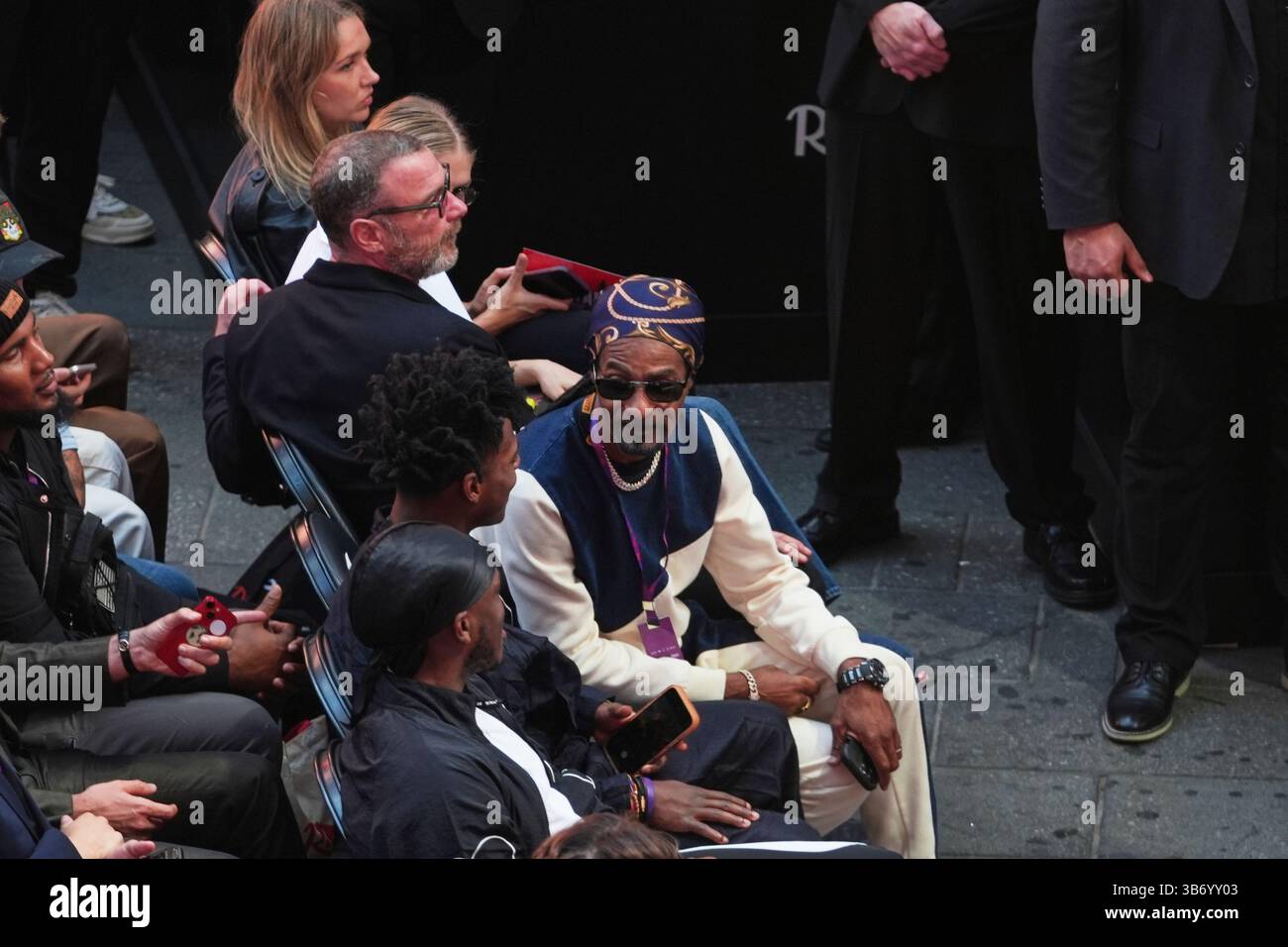 Snoop Dogg attends a boxing match in Times Square Friday, May 2, 2025 ...