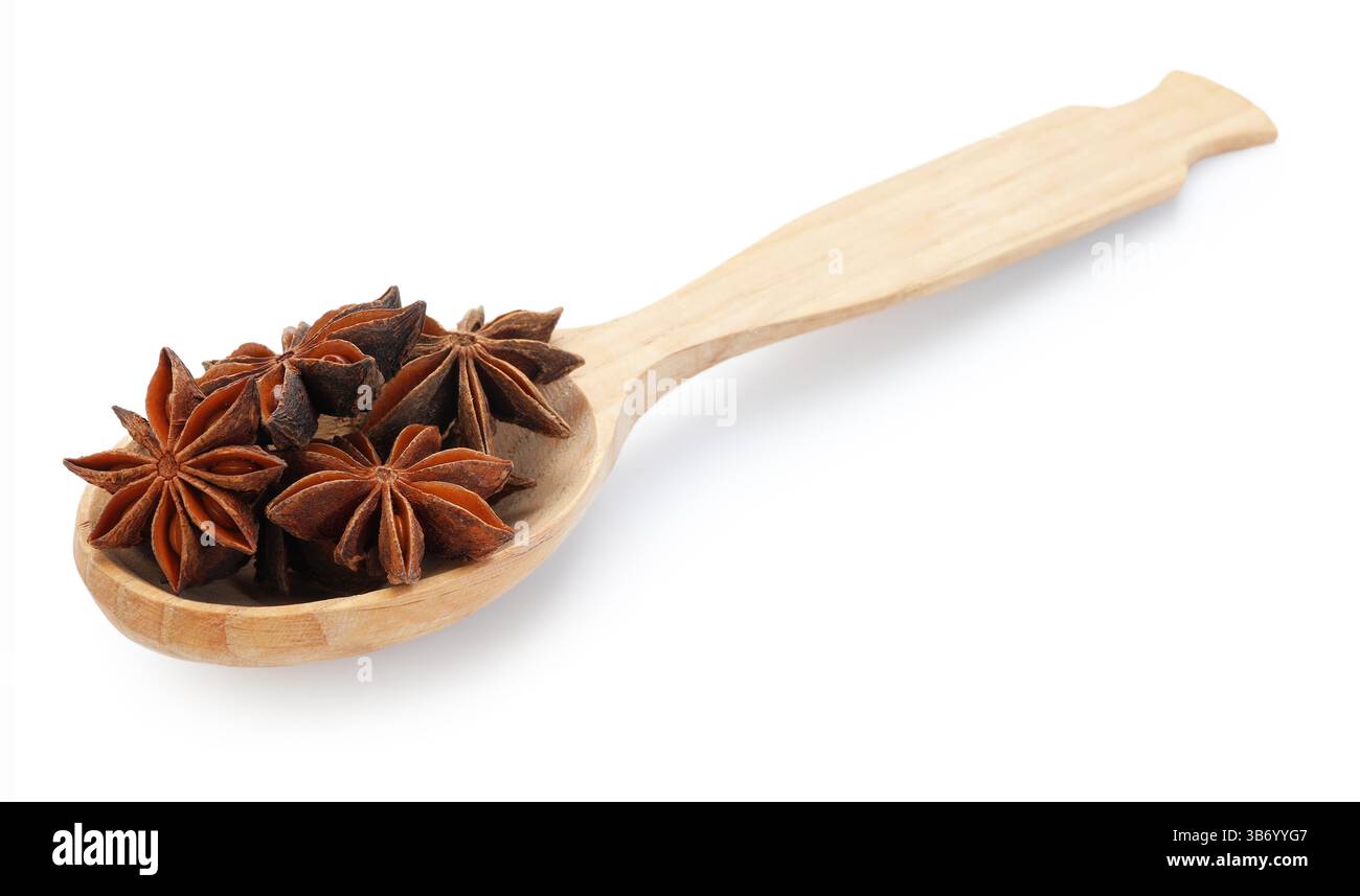 Anise stars in wooden spoon Cut Out Stock Images & Pictures - Alamy