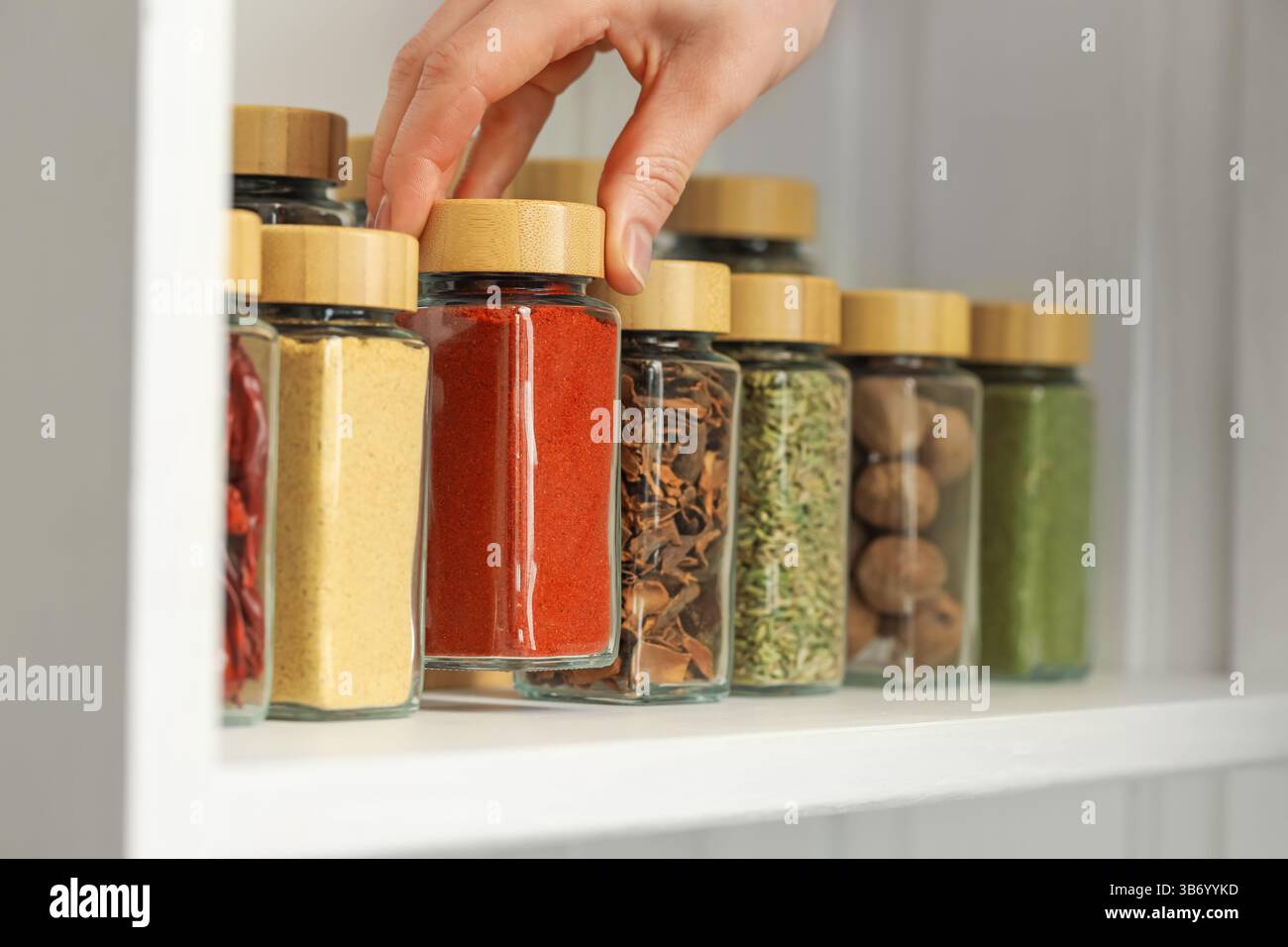 Woman taking jar garlic hi-res stock photography and images - Alamy