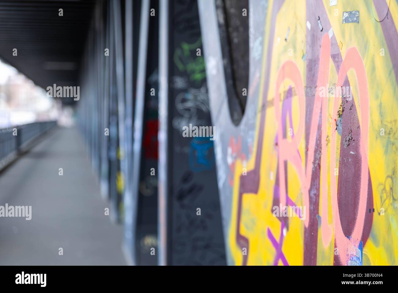Colorful graffiti decorates a modern urban structure in Hamburg ...