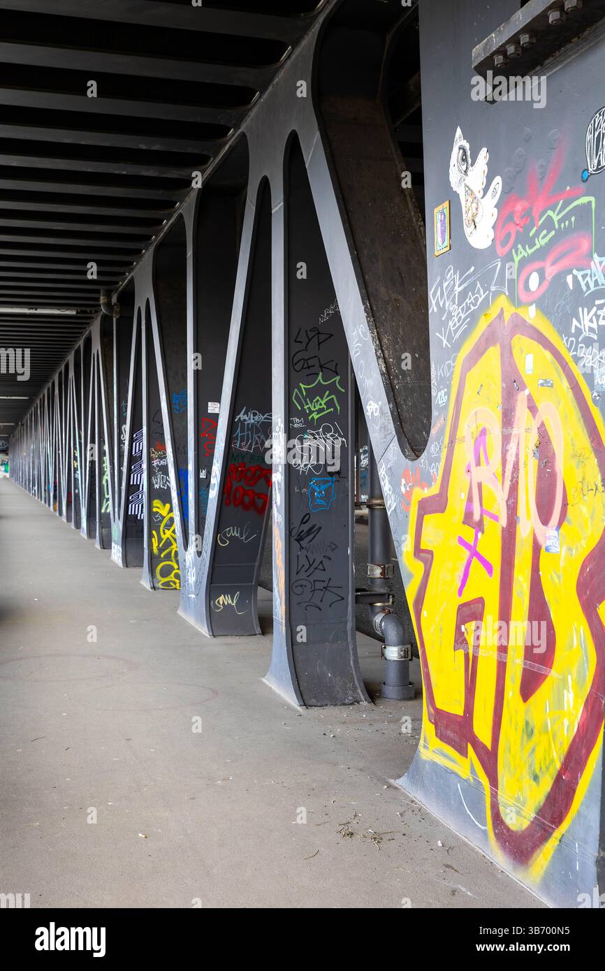 A vibrant underpass in Hamburg showcases unique graffiti art on its ...