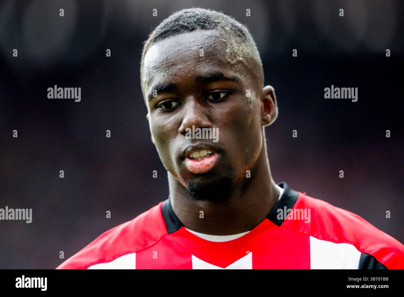 Michael Kayode of Brentford looks on during the Premier League match ...