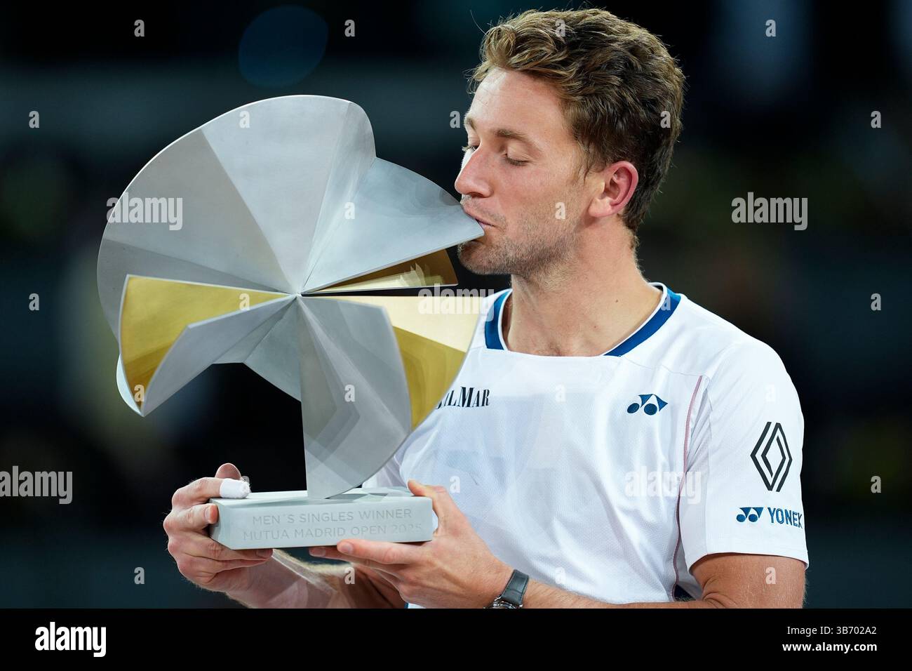Casper Ruud of Norway celebrates with the champion trophy after winning ...