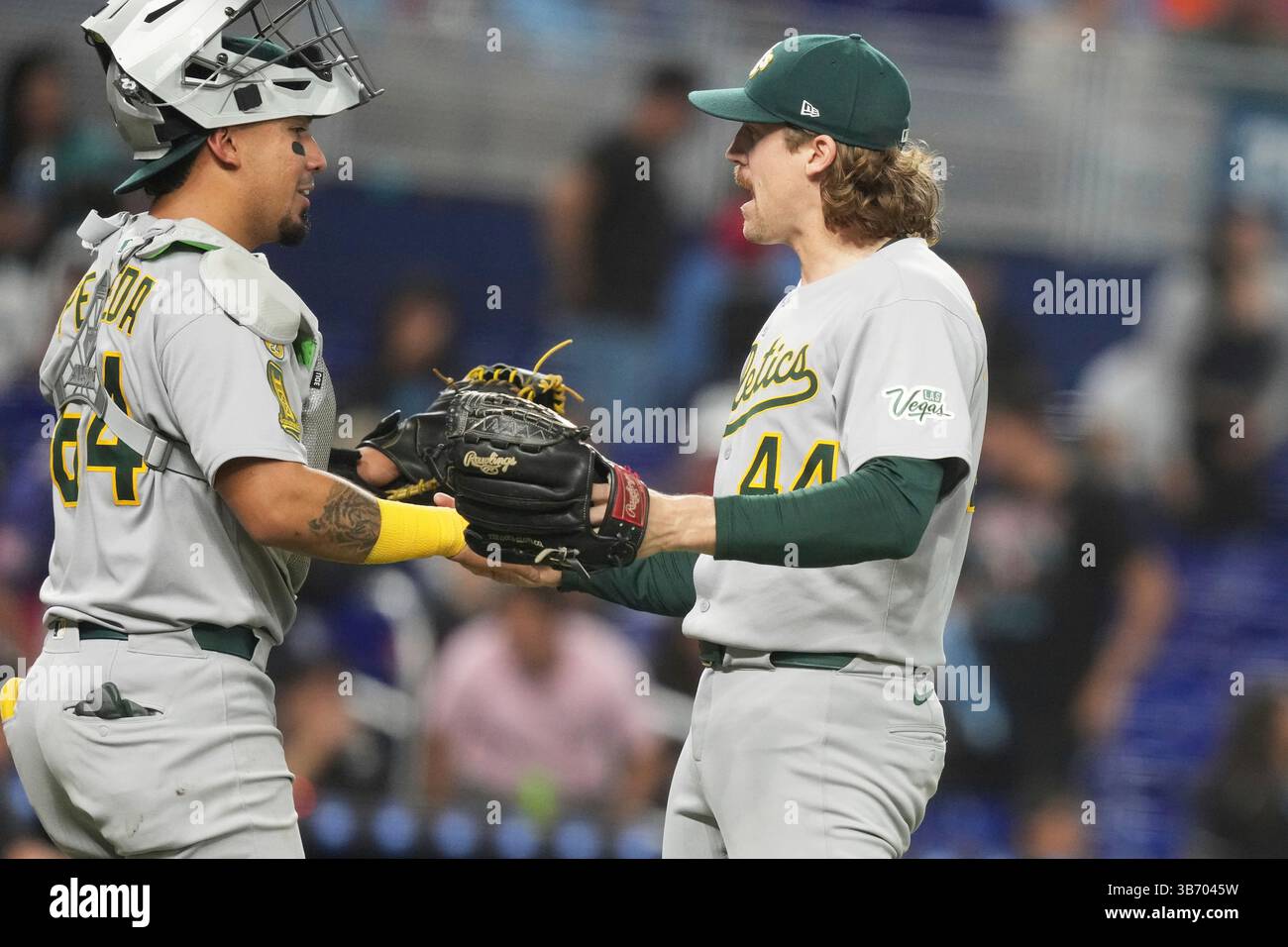Oakland Athletics catcher Jhonny Pereda (64) and pitcher Tyler Ferguson ...