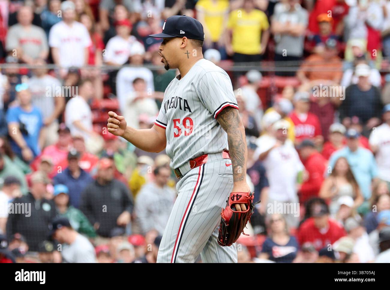Minnesota Twins pitcher Jhoan Duran reacts after striking out Boston ...