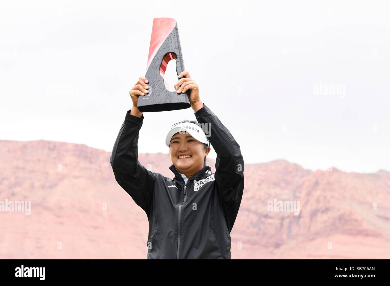 Haeran Ryu, of South Korea, holds the trophy after winning the LPGA ...