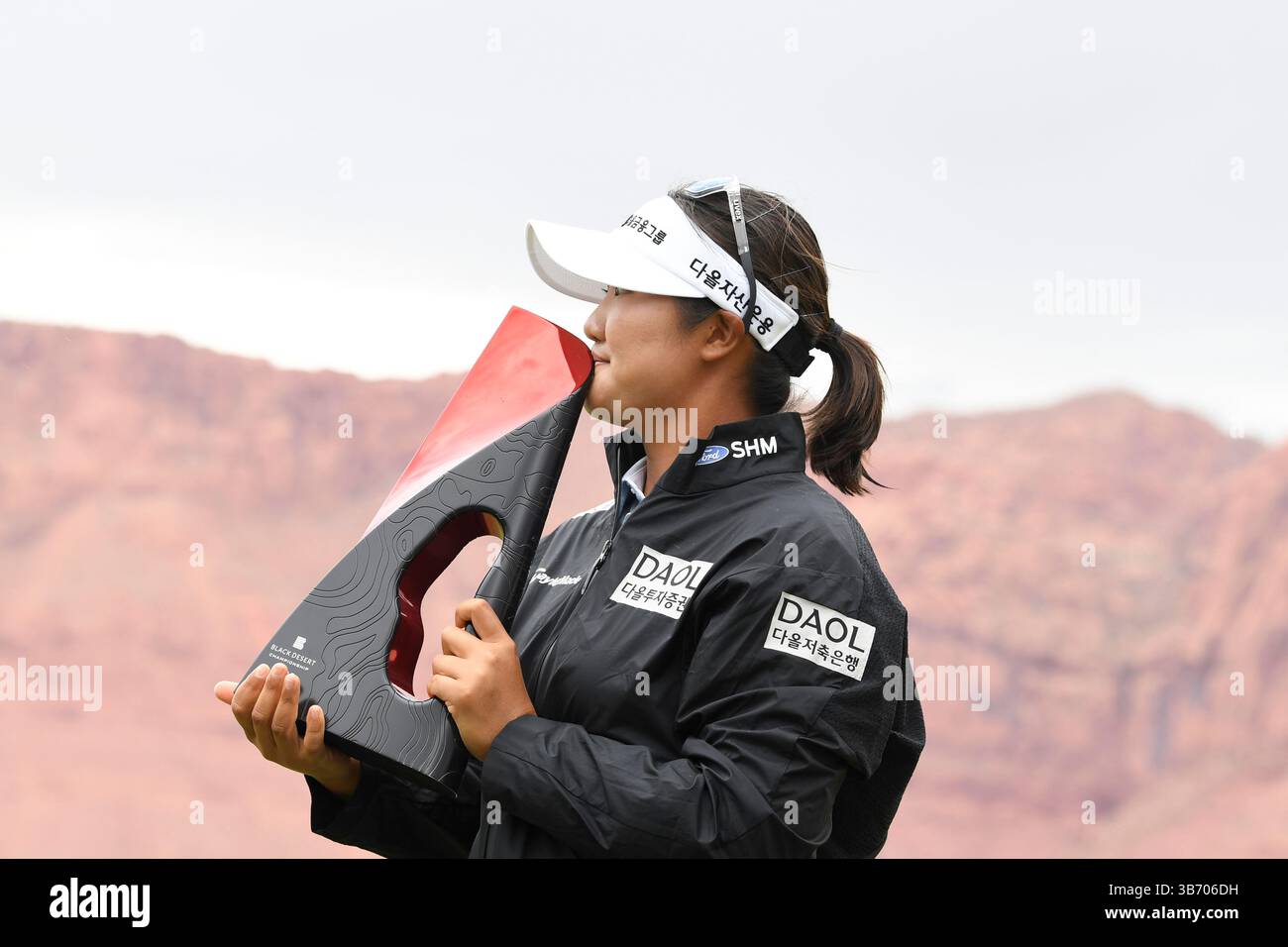 Haeran Ryu, of South Korea, kisses the trophy after winning the LPGA ...