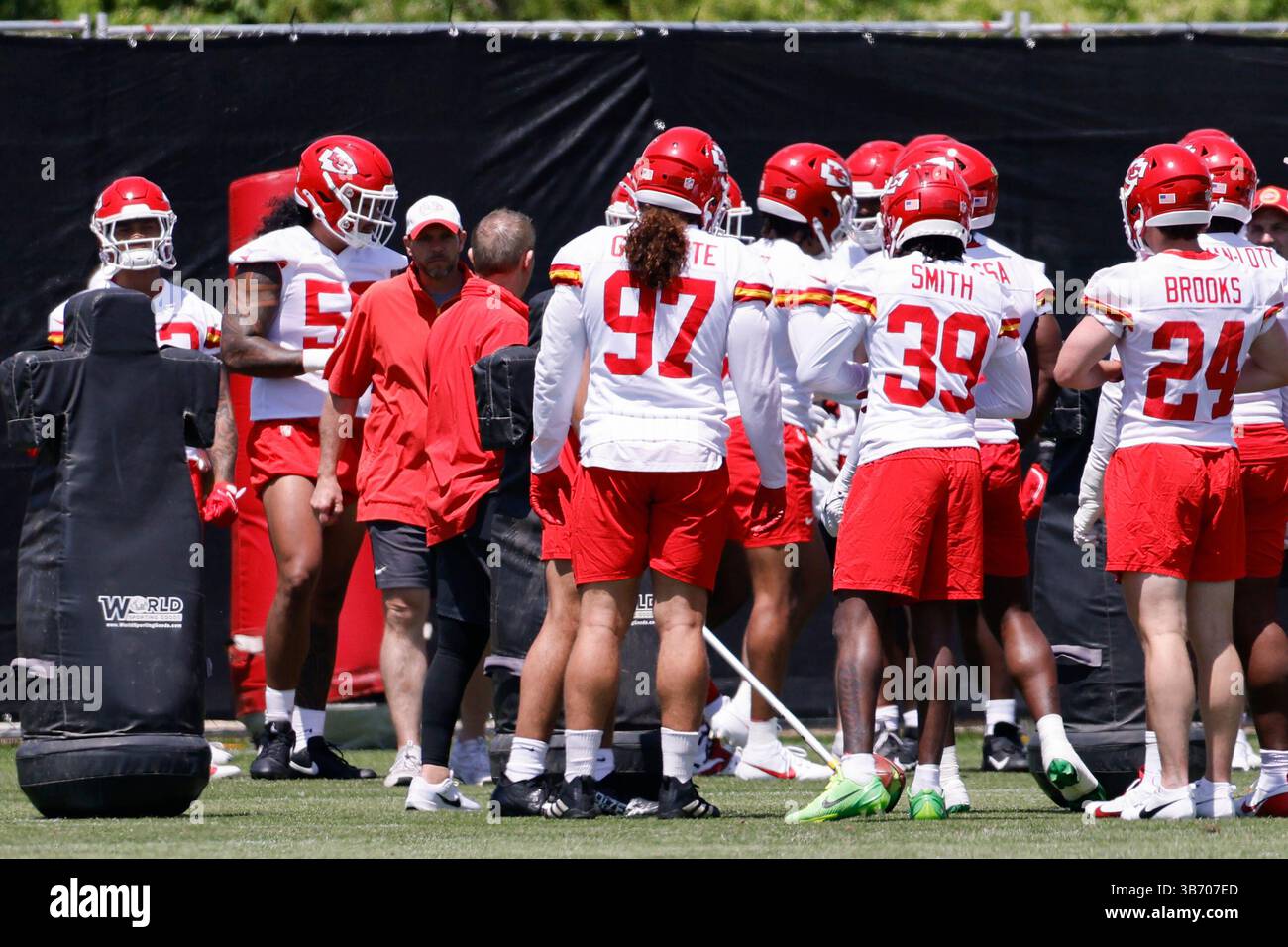Kansas City Chiefs defensive end Ashton Gillotte (97) and other players ...