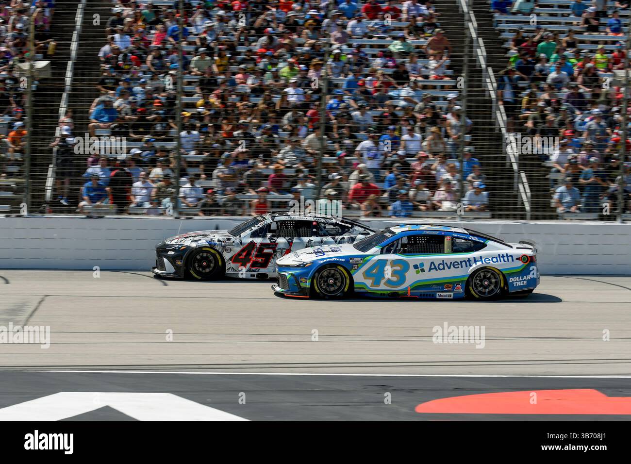 Tyler Reddick (45) and Erik Jones (43) come out of Turn 4 during a ...