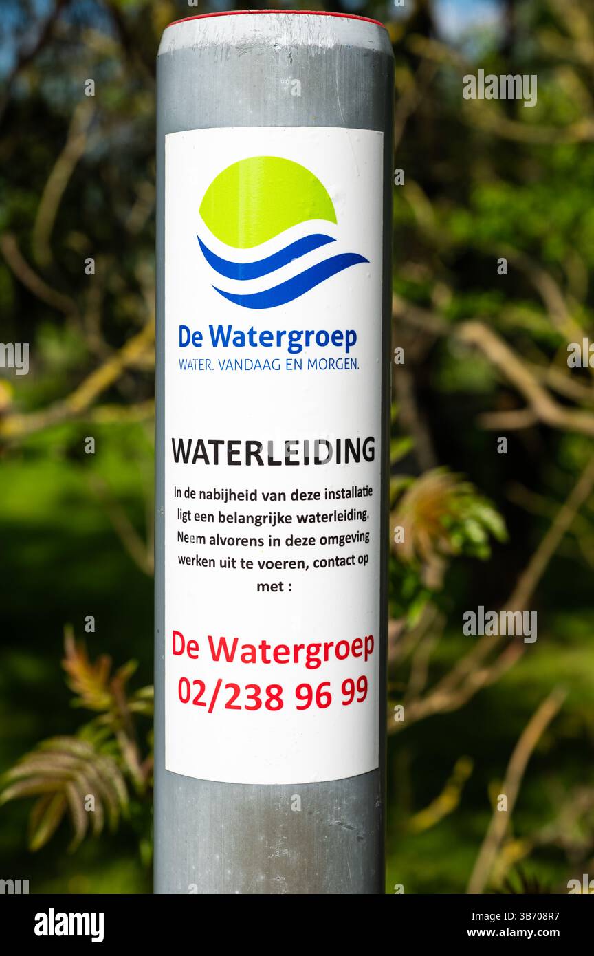 Sign warning for underground water pipes of De Watergroep in Korbeek ...