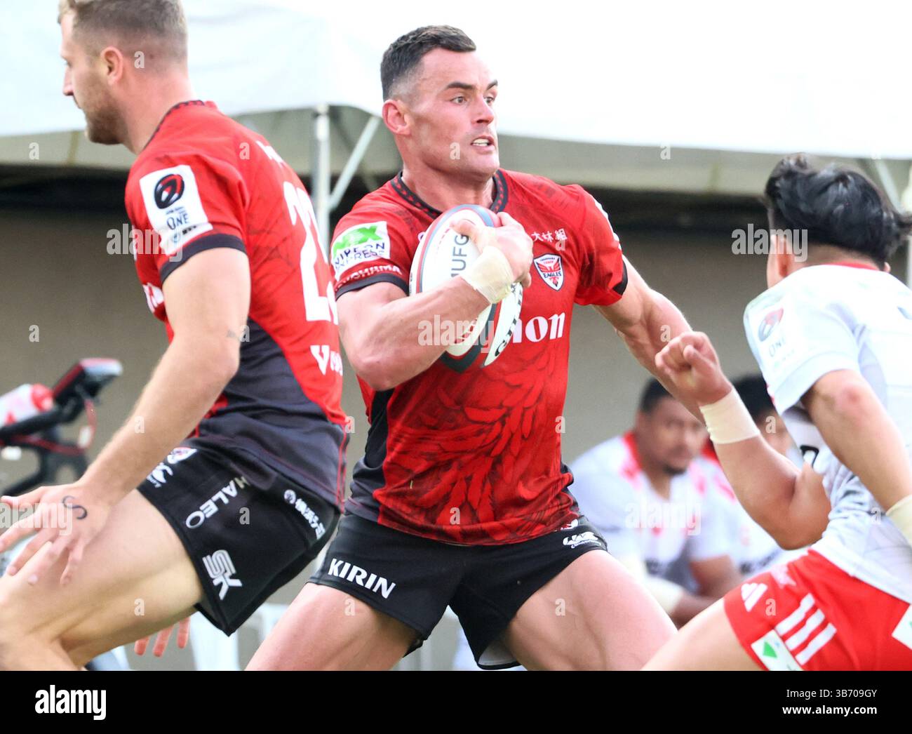 Tokyo, Japan. 4th May, 2025. Yokohama Canon Eagles center Jesse Kriel carries the ball during a ...