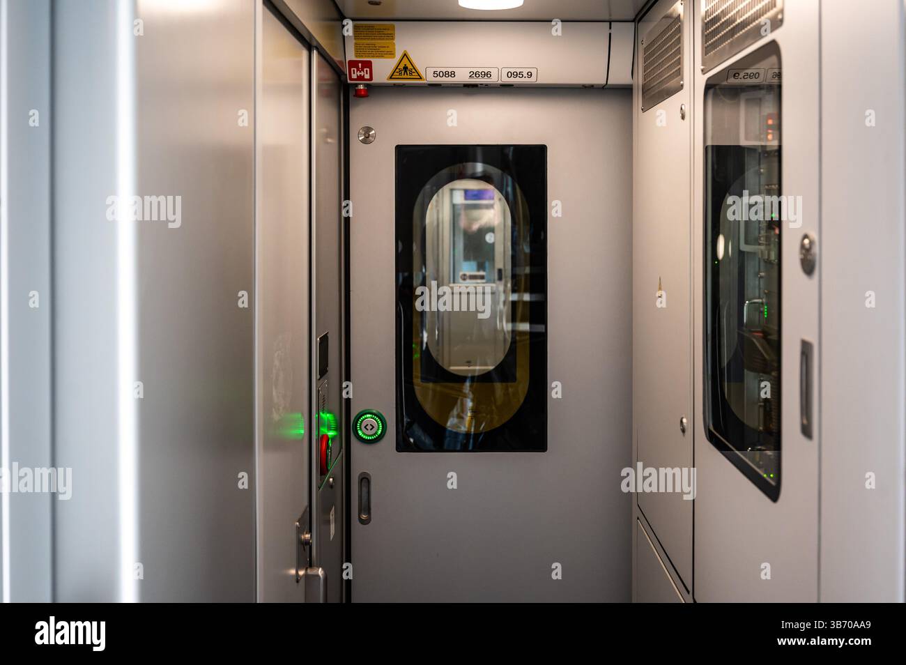 Inside doors, toilet and electricity panel of a train in Brussels North ...