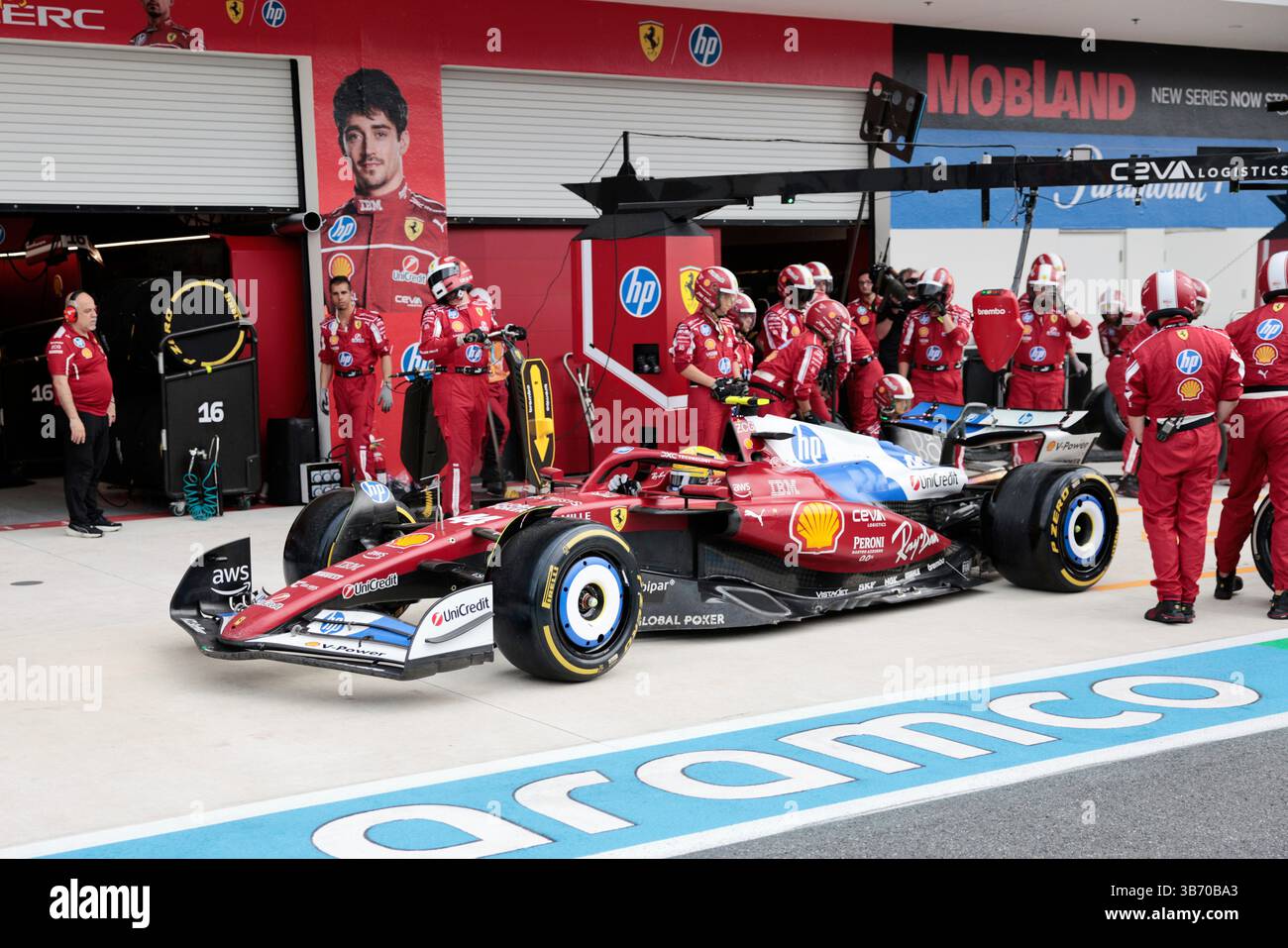 Ferrari driver Lewis Hamilton of Britain makes a pit stop during the ...