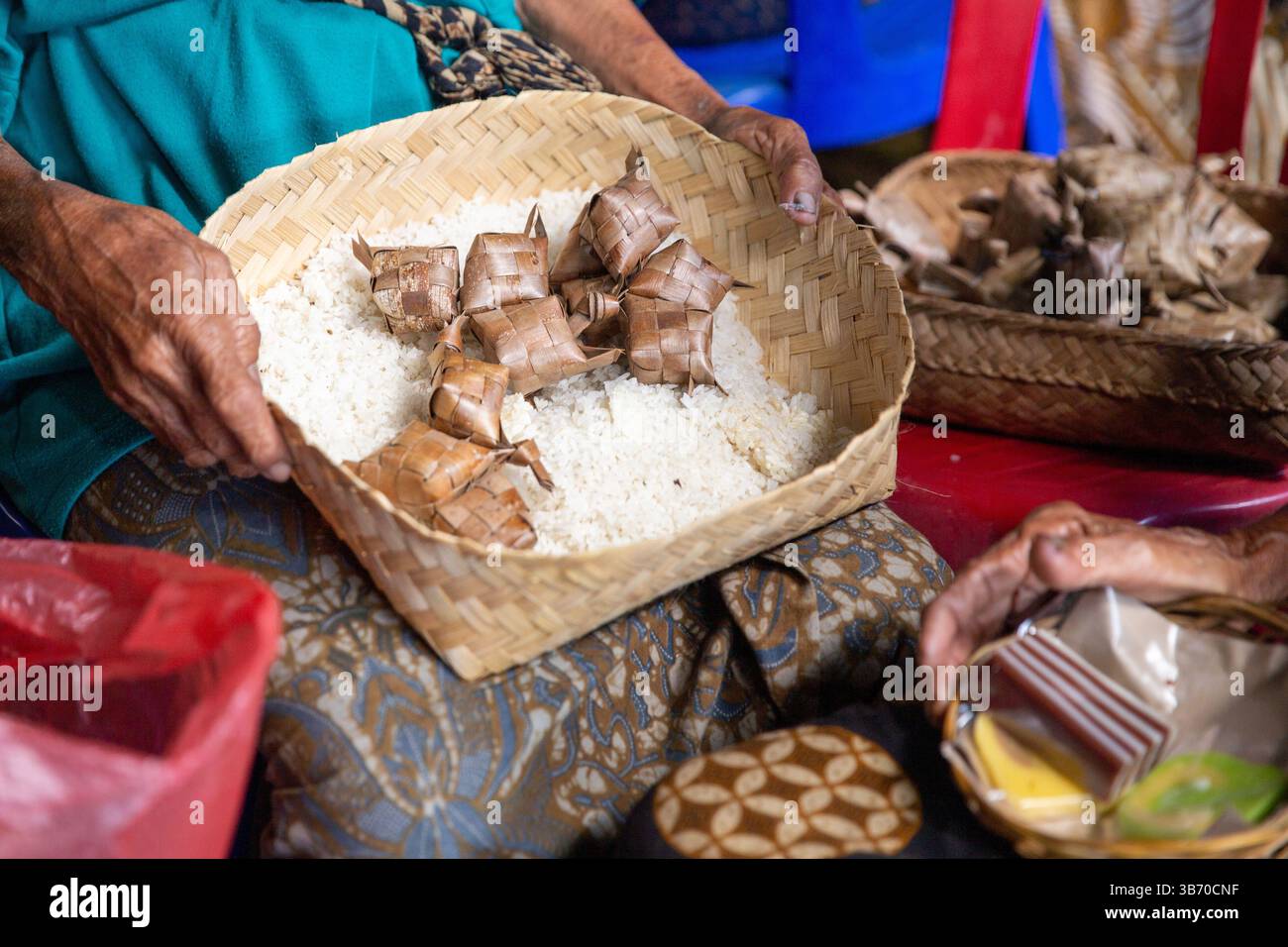 Making Southeast Asian Compressed Rice Packets for a celebration Stock ...