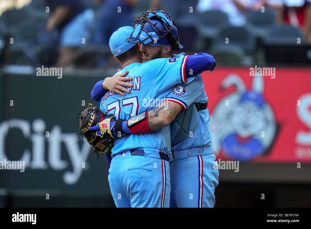Texas Rangers pitcher Luke Jackson, left, and catcher Jonah Heim react ...
