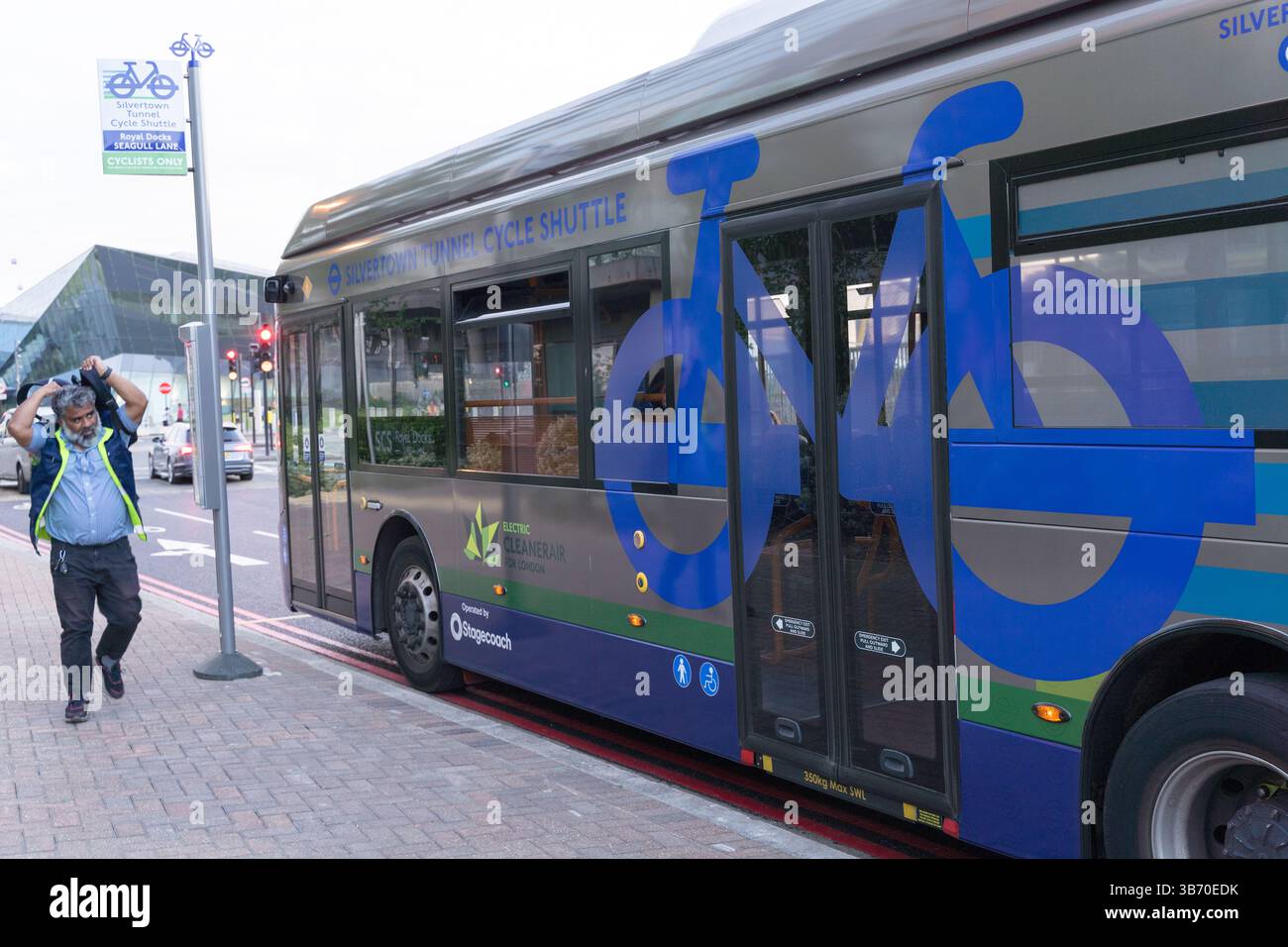 cyclist boarding a Silvertown tunnel Cycle Shuttle bus, running between ...