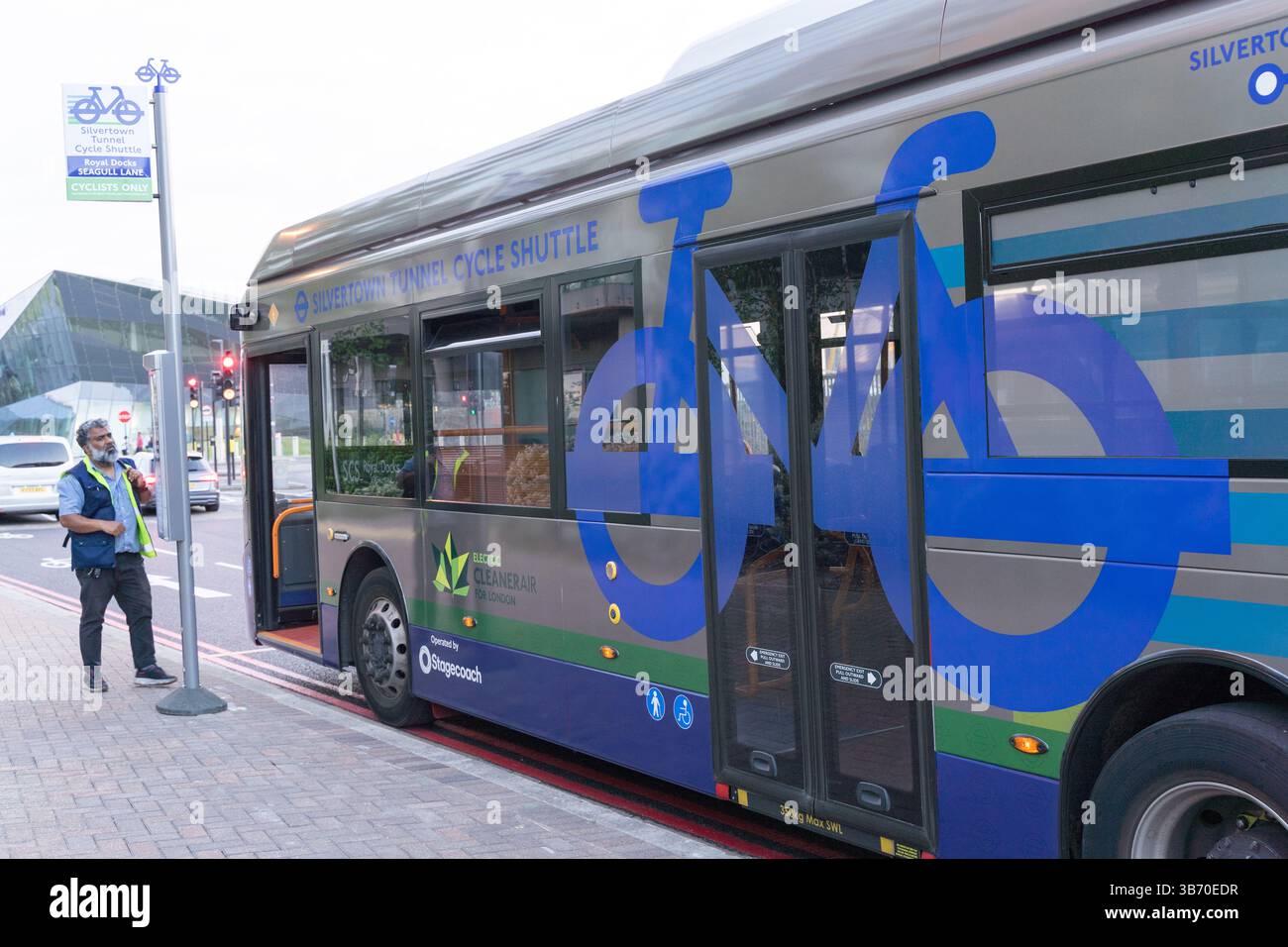 cyclist boarding a Silvertown tunnel Cycle Shuttle bus, running between ...