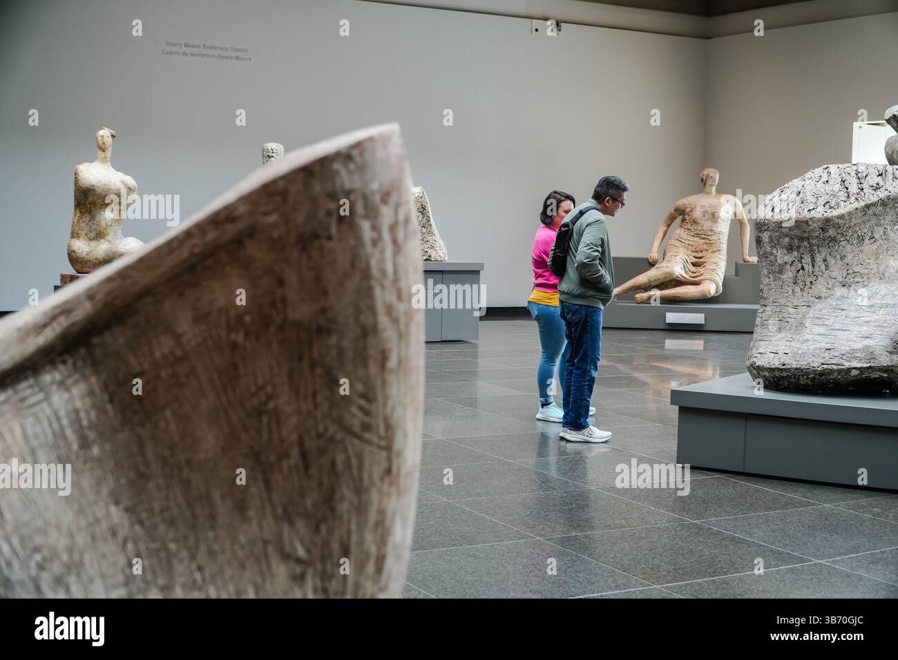 Henry Moore Sculpture Centre. Visitors view sculptures by Henry Moore ...