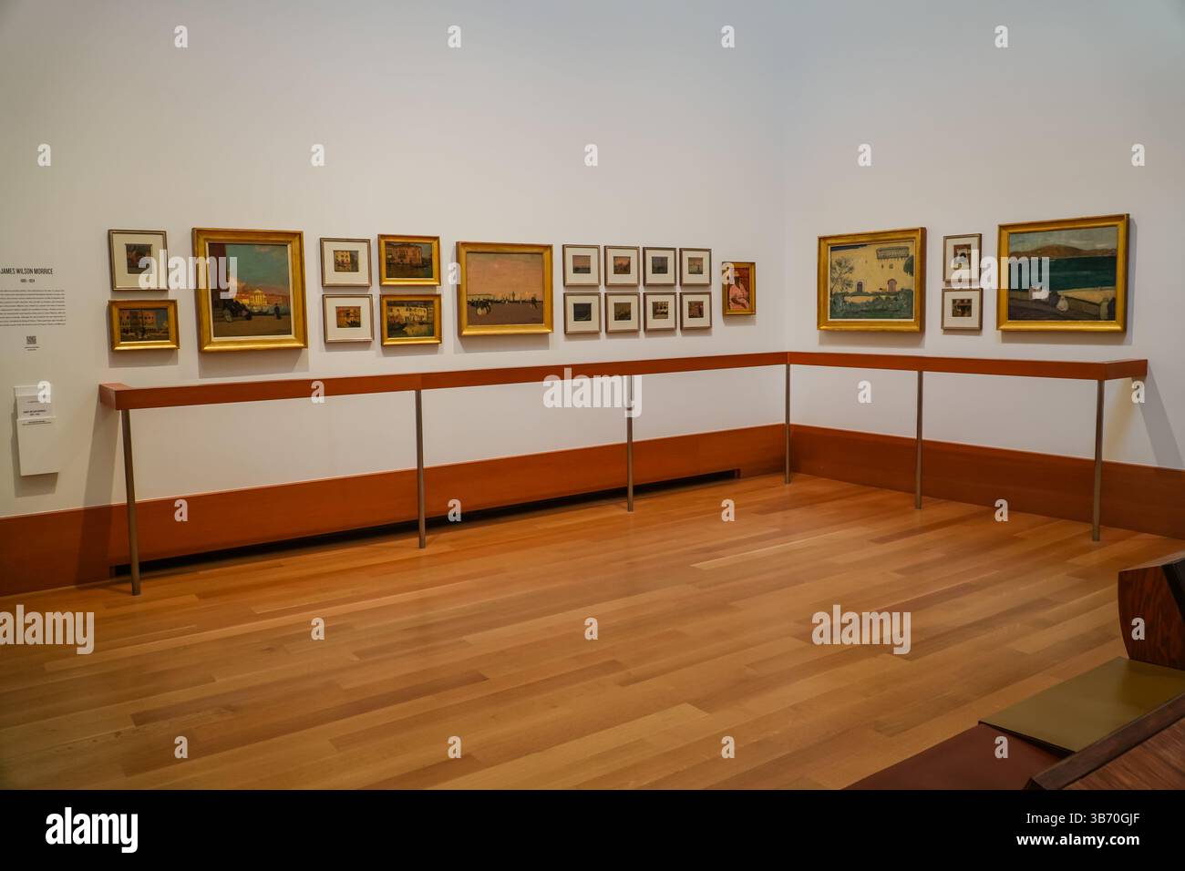 Interior view of an art gallery showing an exhibition of paintings by ...