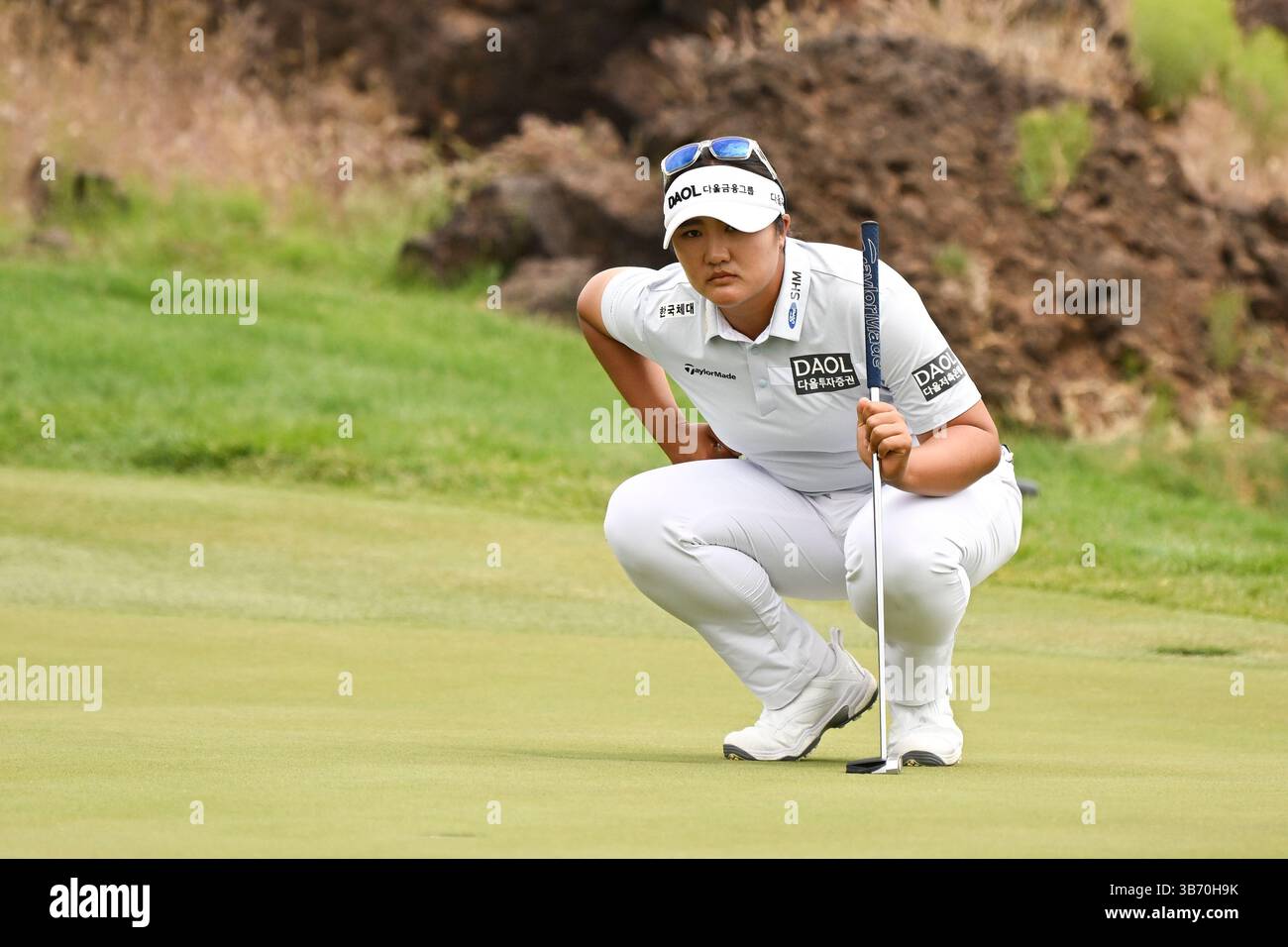 Haeran Ryu, of South Korea, prepares to putt on the 15th green at the ...