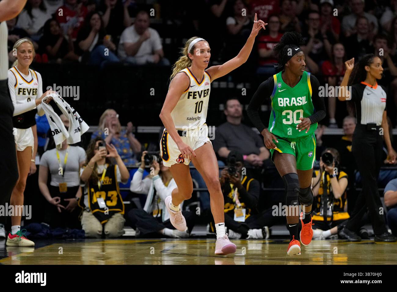 Indiana Fever guard Lexie Hull (10) celebrates after making a 3-point ...