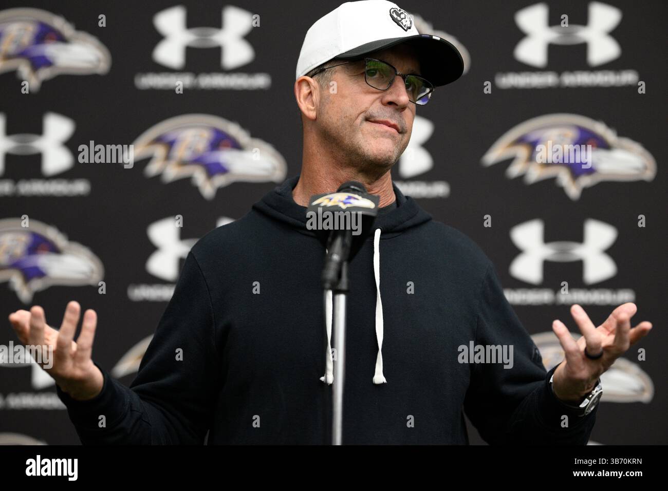 Baltimore Ravens head coach John Harbaugh talks to the media after an ...