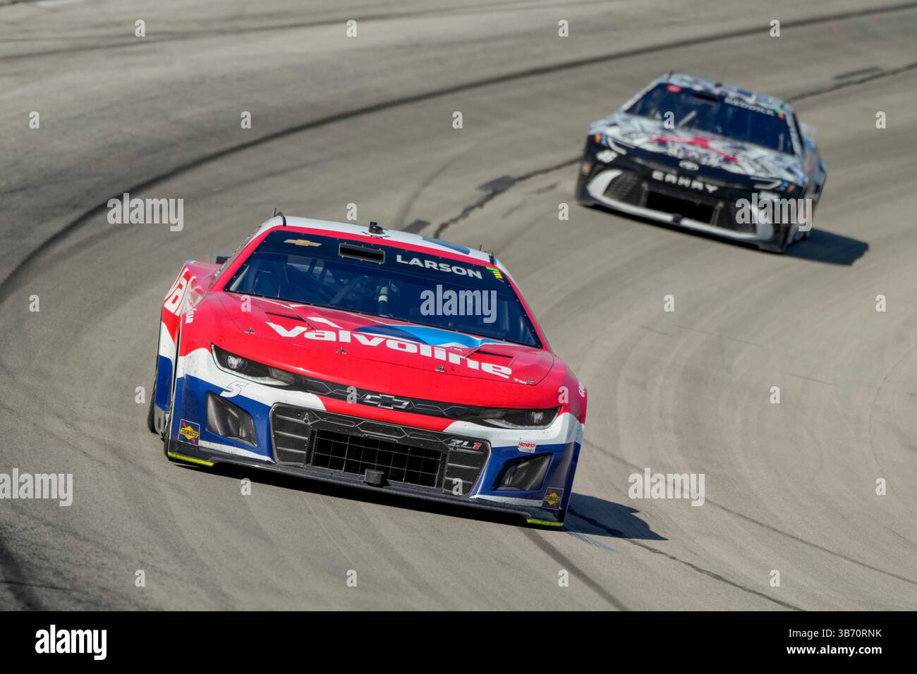 Kyle Larson, front, leads the pack with Tyler Reddick (45) in pursuit ...